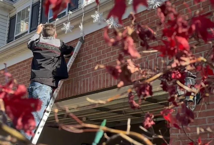 Person-decorating-house